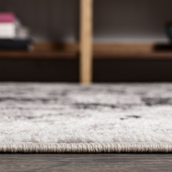 17 Stories Bettencourt Abstract Cream/Black Area Rug & Reviews | Wayfair