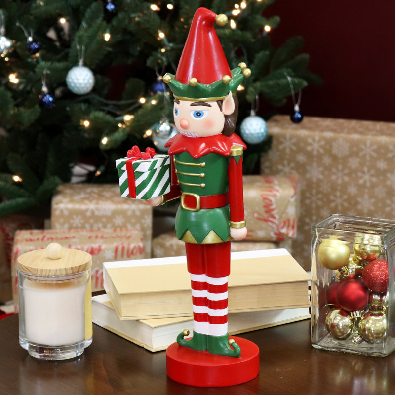 The Holiday Aisle® Jingles The Christmas Elf Nutcracker Statue | Wayfair