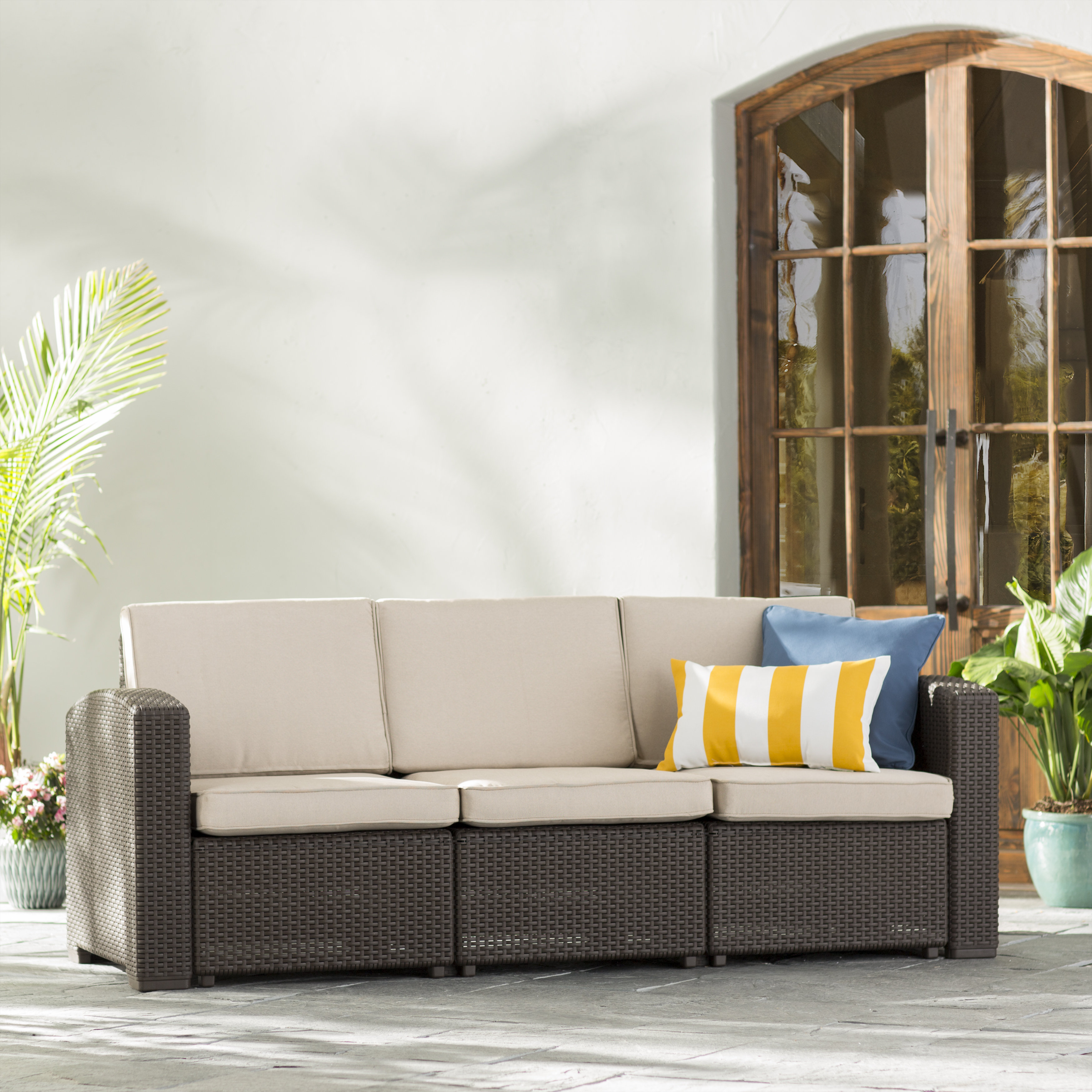Beachcrest Home Alderman Faux Rattan Sofa with All-Weather Cushions ...