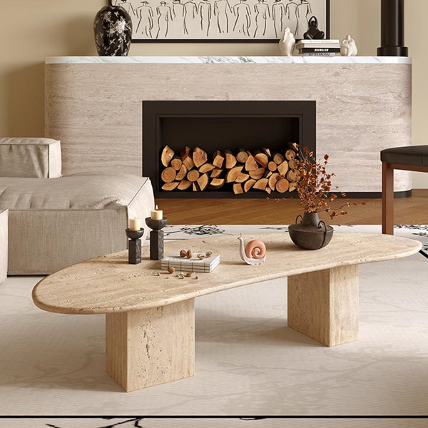 Creature B Comforts Natural cave stone cream style coffee table | Wayfair