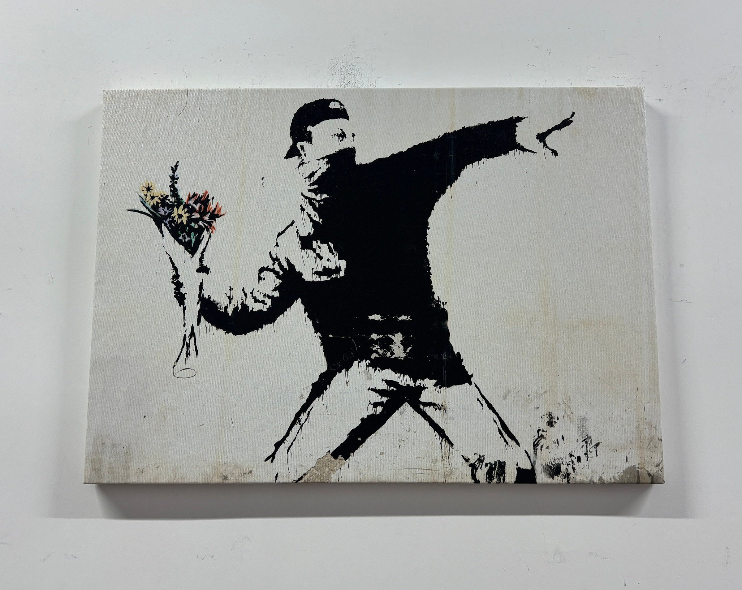 kayra export Banksy-Inspired Graffiti Art Featuring a Figure Throwing ...