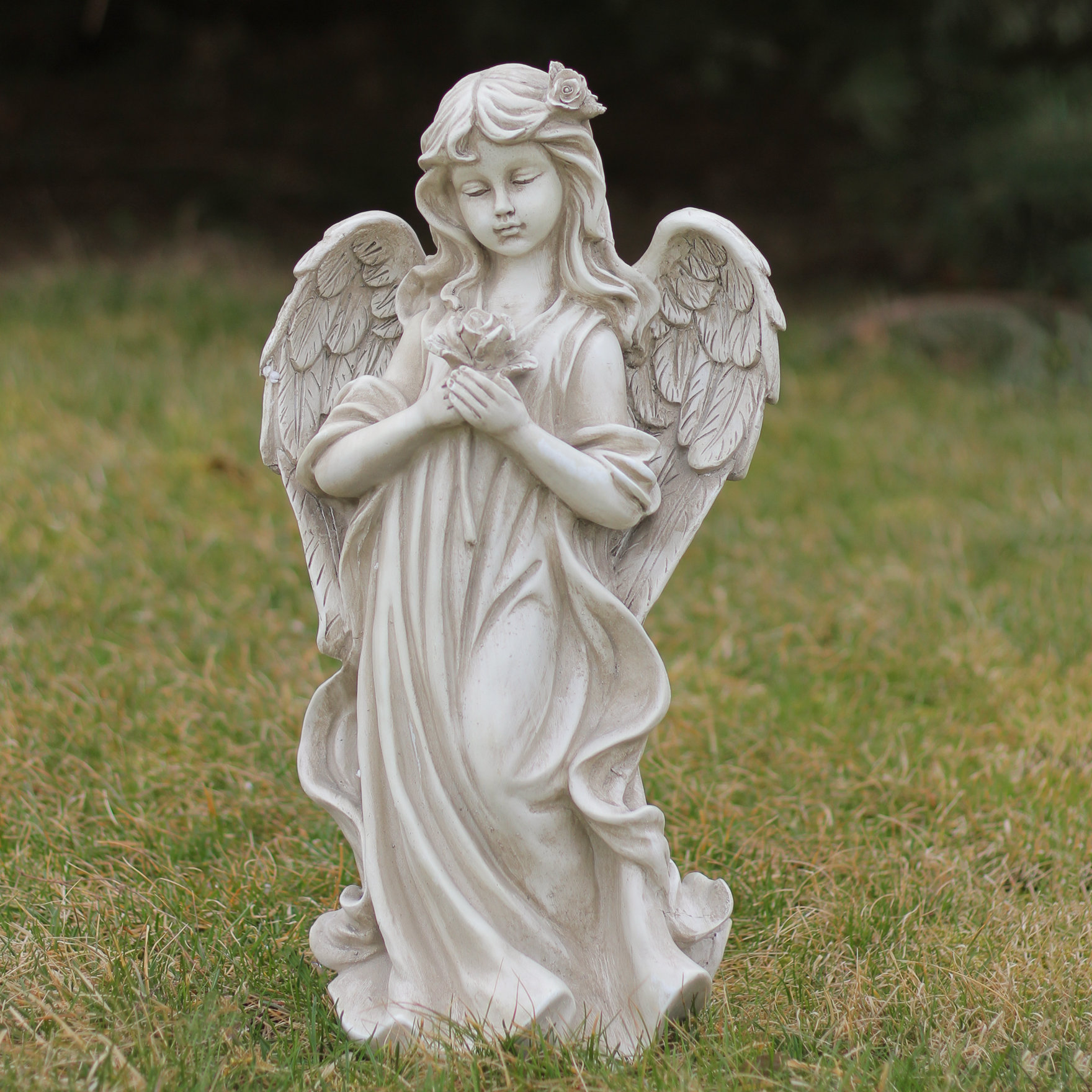 Trinx 17" Peaceful Angel Holding a Rose Outdoor Garden Statue & Reviews ...