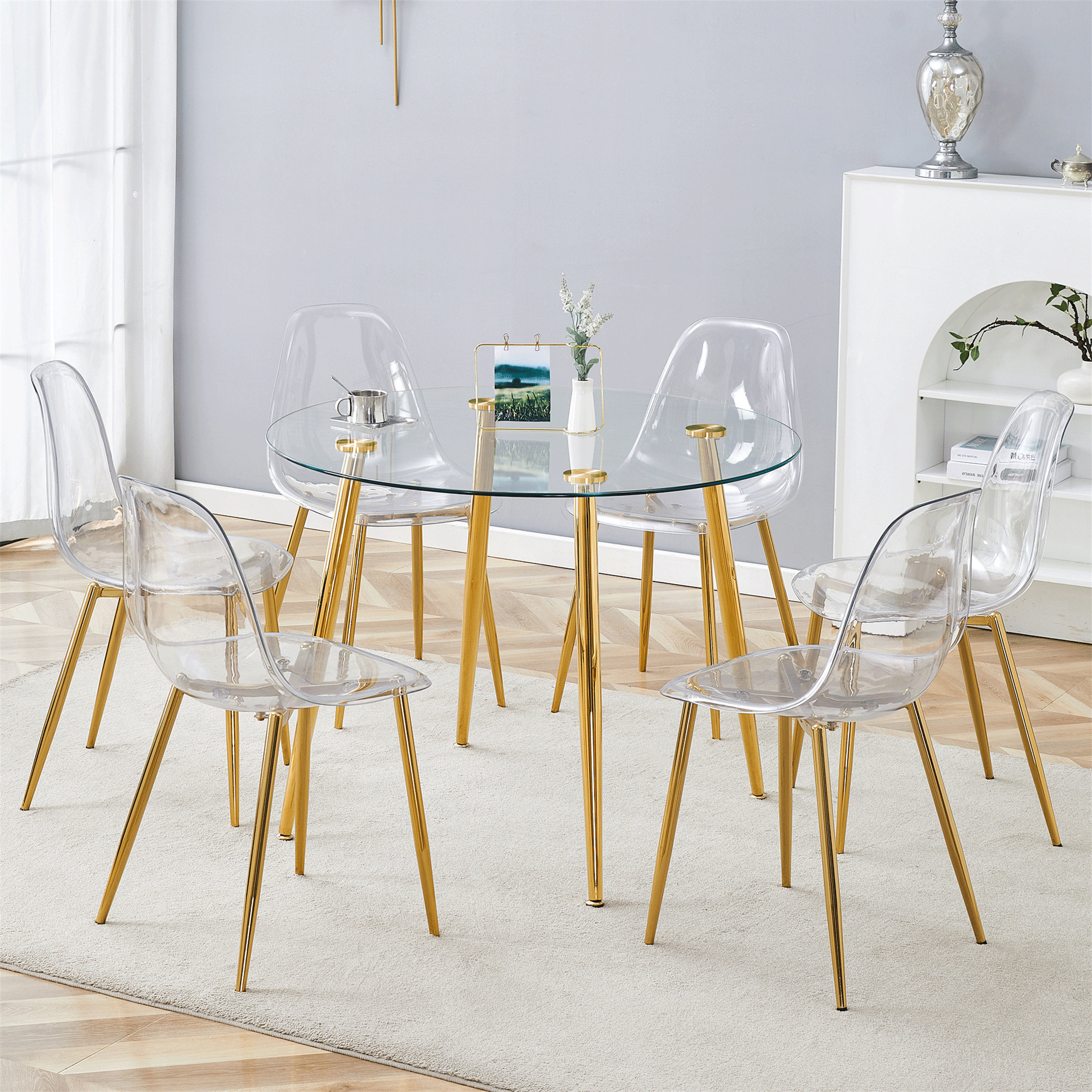 Mercer41 round transparent tempered glass table with gold metal legs ...