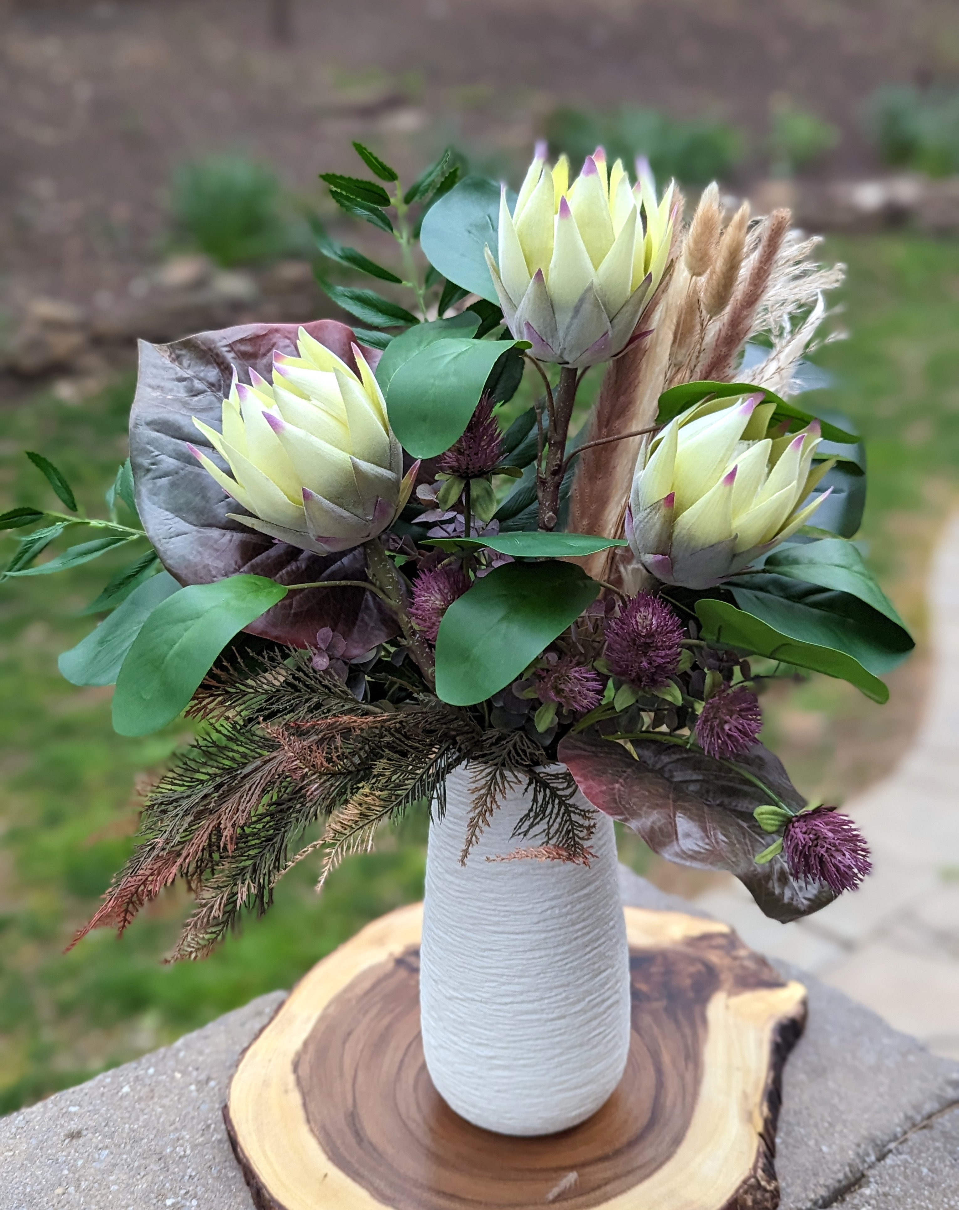 Primrue Protea Floral Arrangement in Vase | Wayfair
