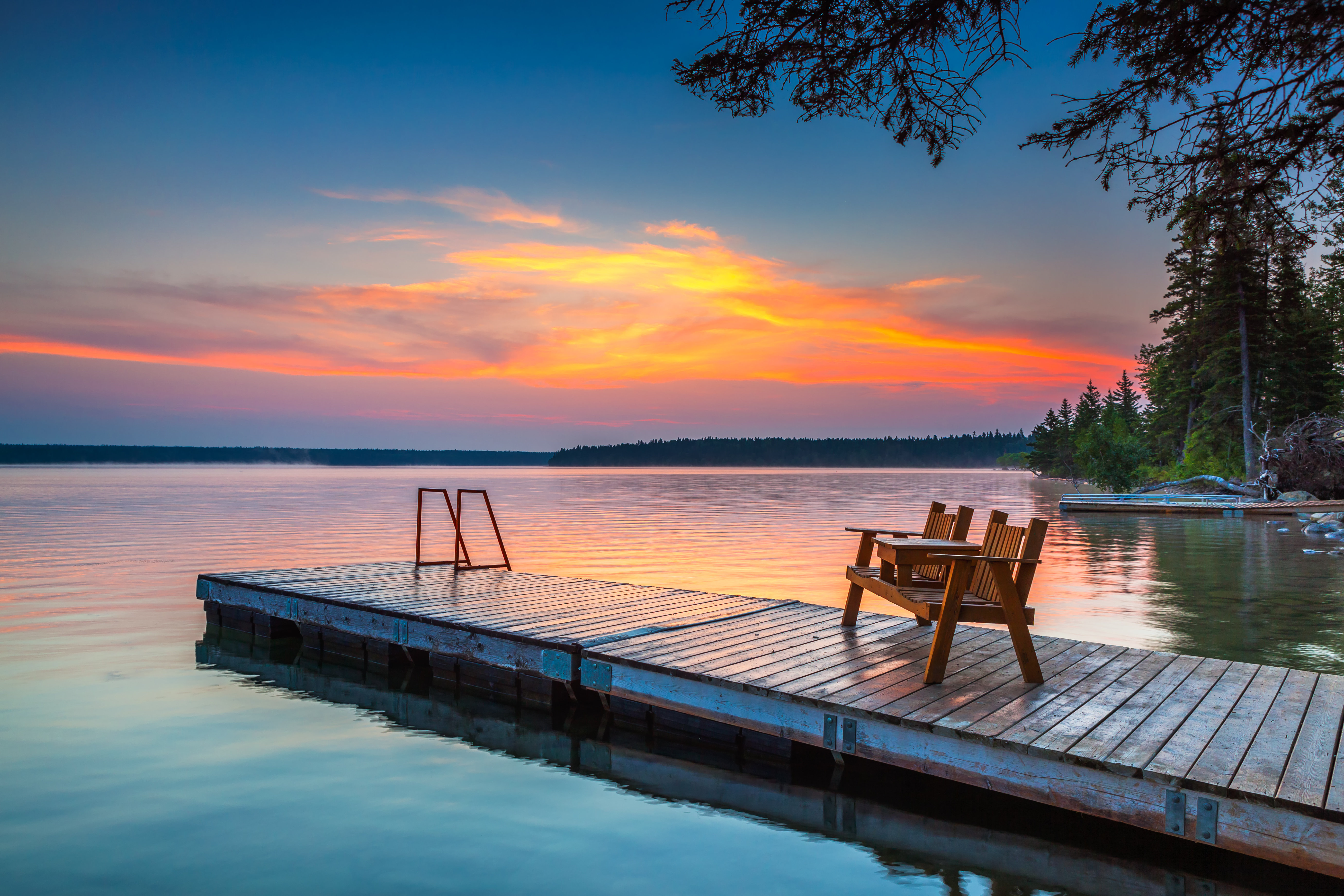 Millwood Pines Sunrise over the Dock in Clear Lake, Manitoba by ...