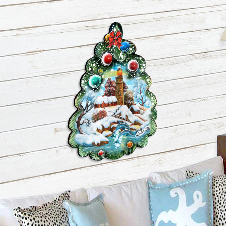 The Holiday Aisle® Lighthouse Tree Hanging Figurine Wood Door Hanger ...