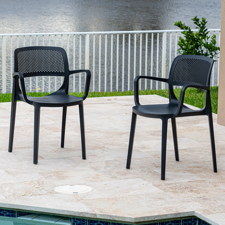 Rainbow Outdoor Stacking Patio Dining Armchair - Wayfair Canada