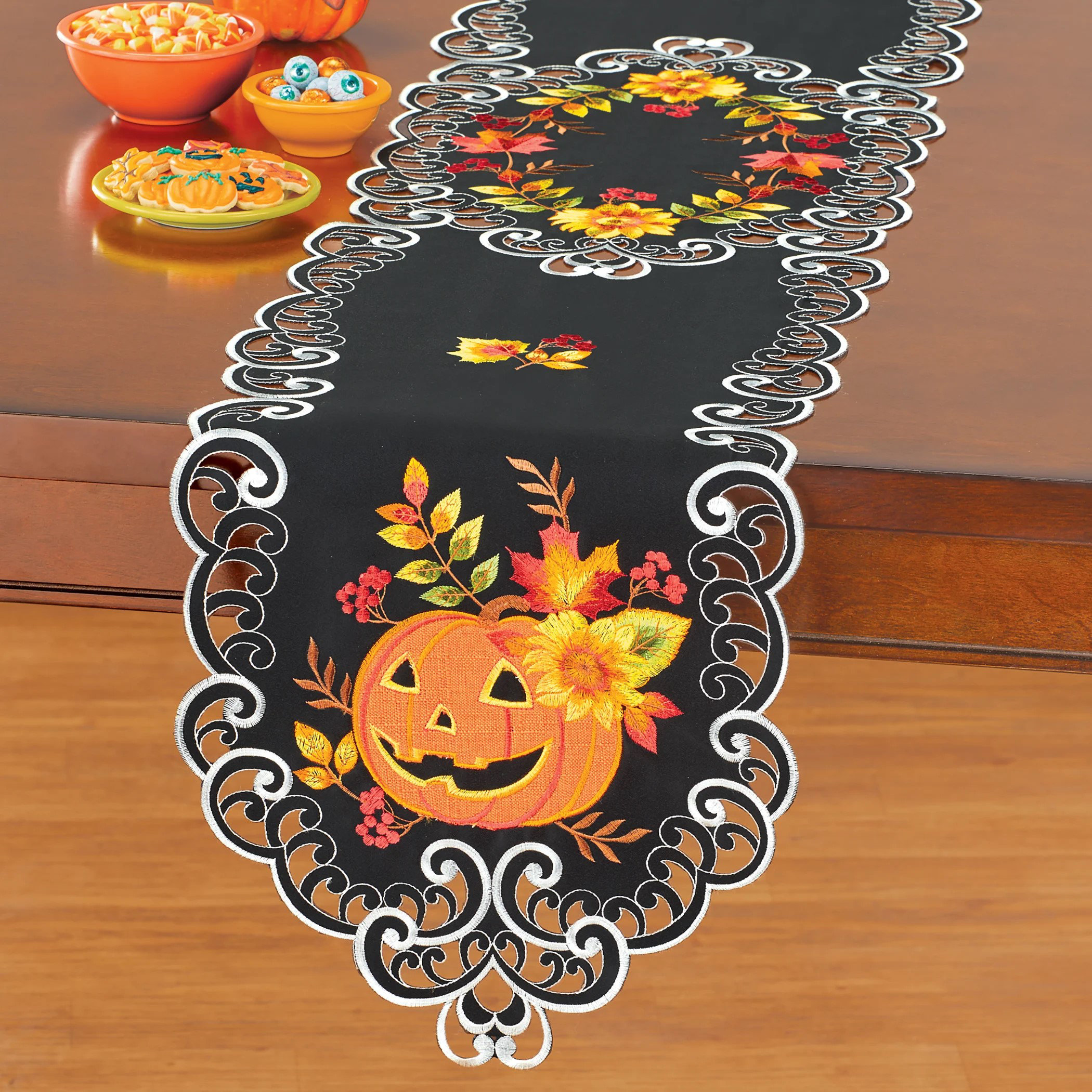 The Holiday Aisle® Karriem Spooky Pumpkin Table Topper | Wayfair