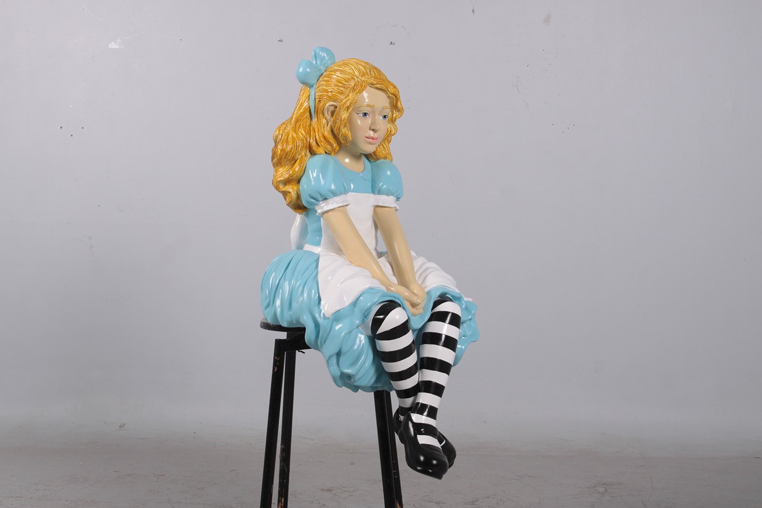 LM Treasures Alice Sitting Statue | Wayfair
