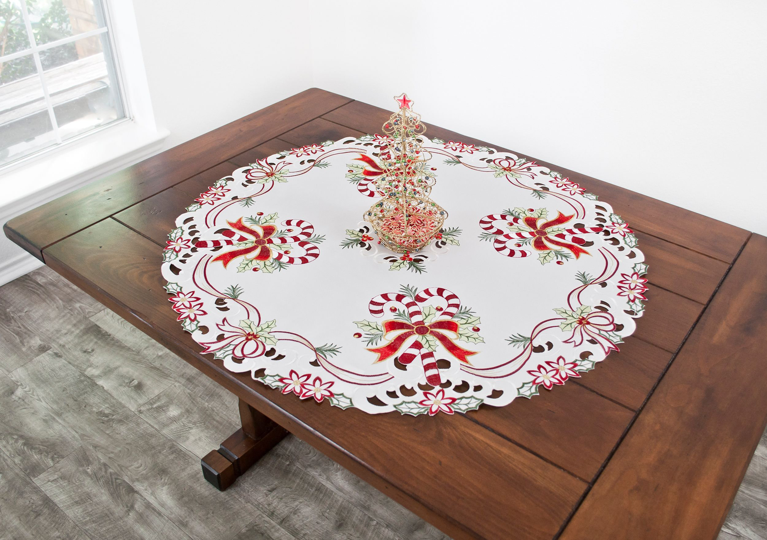 The Holiday Aisle® Julyus 33" Round Holiday Candy Cane on White Table ...