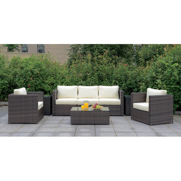 Ebern Designs Morrell Patio Sectional with Cushions & Reviews | Wayfair