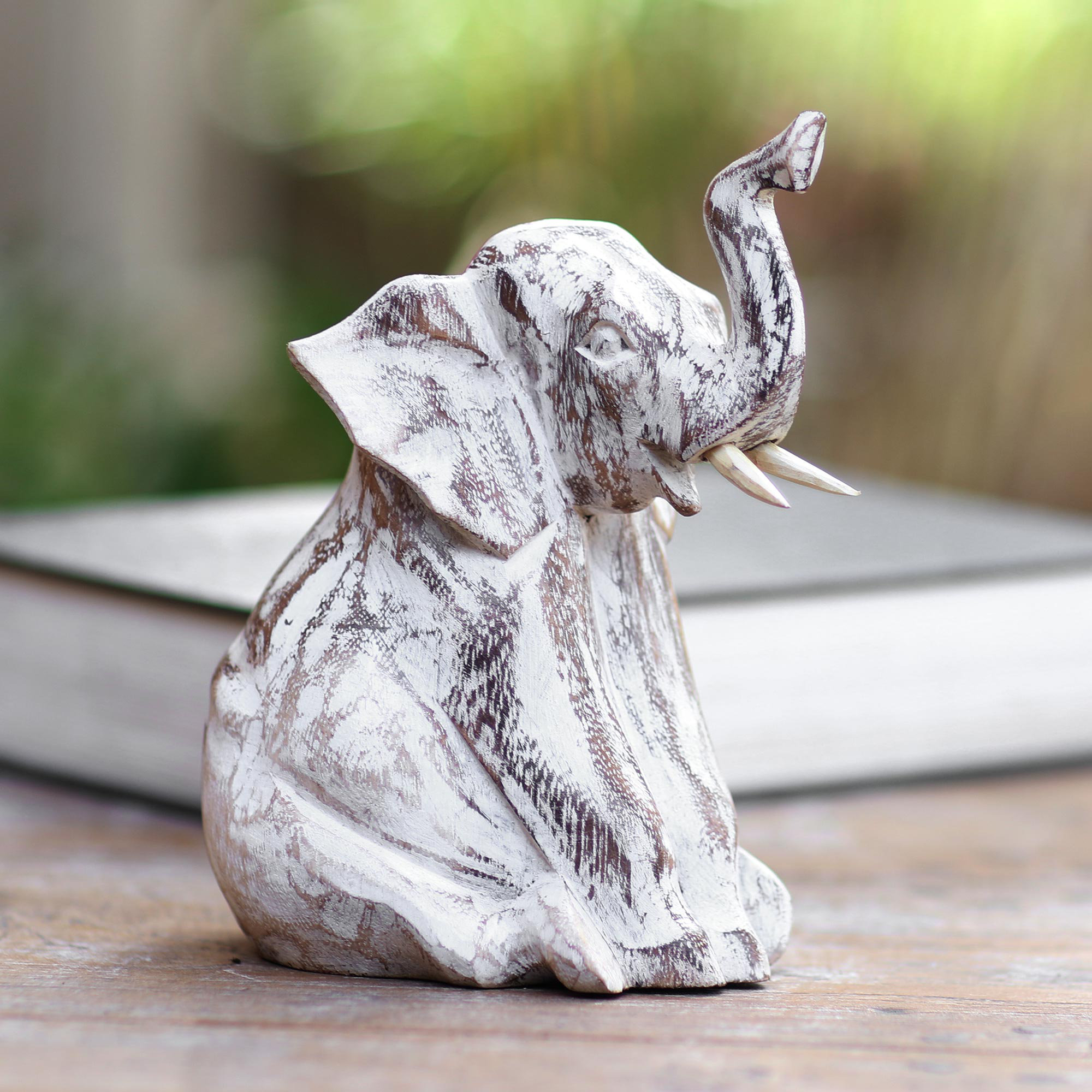 Bungalow Rose Handmade Rustic Sitting Elephant Wood Sculpture | Wayfair