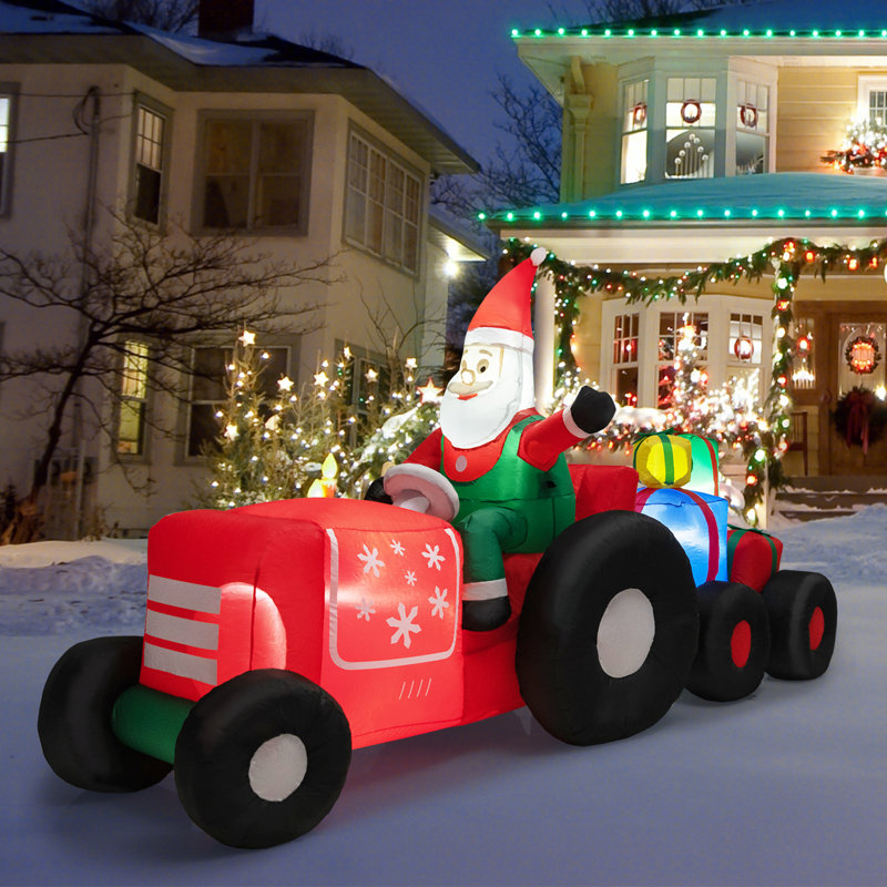 The Holiday Aisle® Santa Claus Driving Tractor Inflatable & Reviews ...