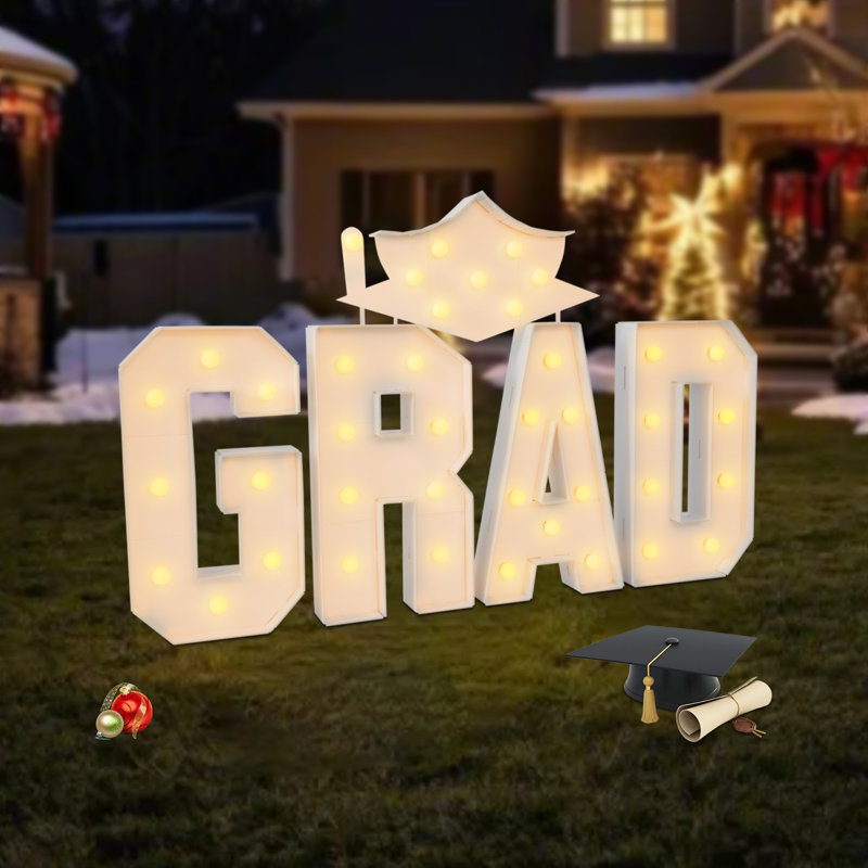 The Holiday Aisle® GRAD Lighted Sign For Graduation Decorations | Wayfair